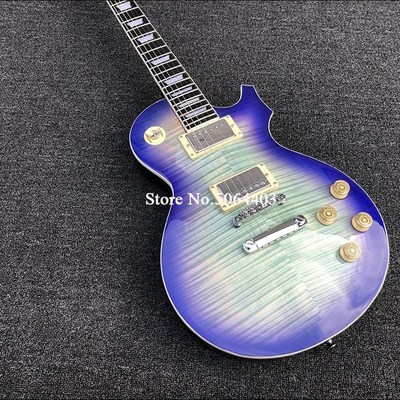 New electric guitar, purple paint, maple tiger veneer, peach