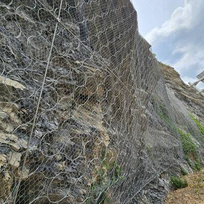 主动边防坡护21042网导引式护坡柔性覆盖网环帘式落石保护安形全