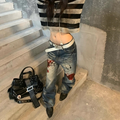蓝水洗做脏烫钻微喇弯刀牛仔裤
