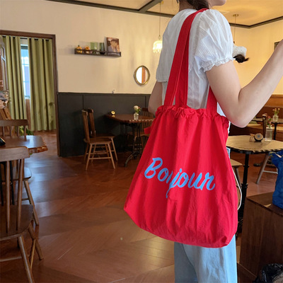 47251 韩版新款字母印花单肩包休闲抽绳束口时尚学生上课单肩包