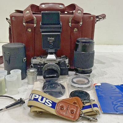 OLYMPUS OM10 50MM MANUAL FOCUS CAMERA LENSES ACCESSORIES AND