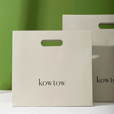 镂空手提纸袋礼品袋手提纸袋定制印刷loNgo大小服装纸袋定制