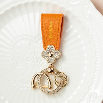 次日达创意四叶钥匙闪钻扣草手汽车炼女生i绳ns书包挂饰简约精致