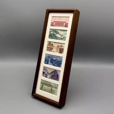 Six-panel black walnut photo frame, believed to bring fortun