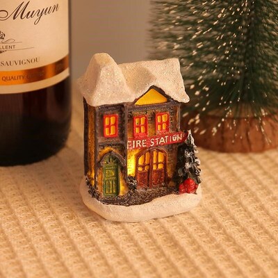 Christmas decorations, colorful glowing house tabletop