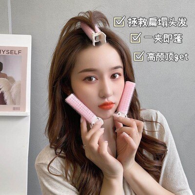 A hair styling tool for creating voluminous roots and a lift