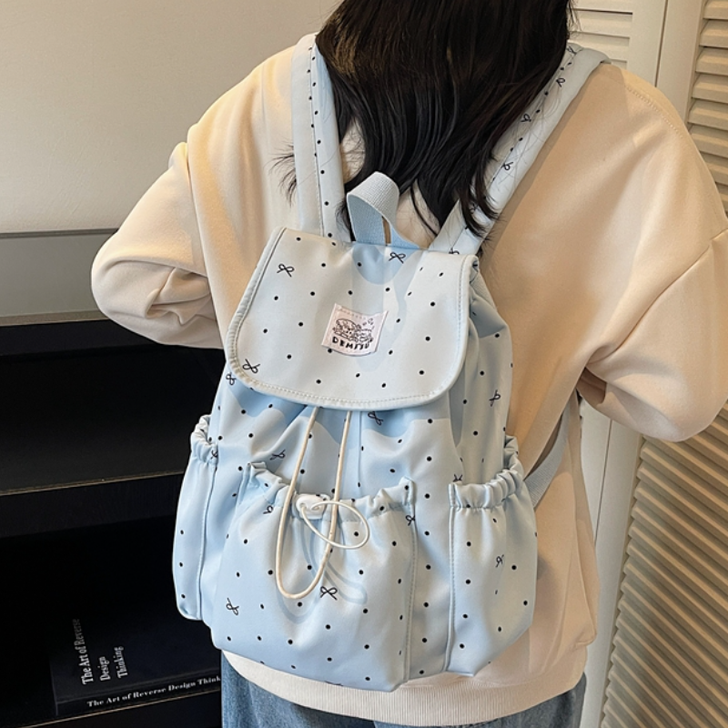 氛围感小书包波点蝴蝶结抽绳简约双肩包女大学生通勤旅游小背包女