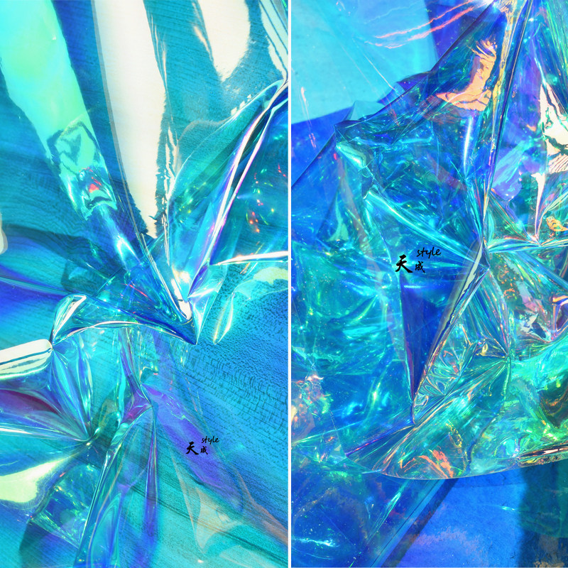 镜面防水镭射幻彩闪光透明tpu面料风雨衣包pvc婚庆设计师服装布料_虎窝淘