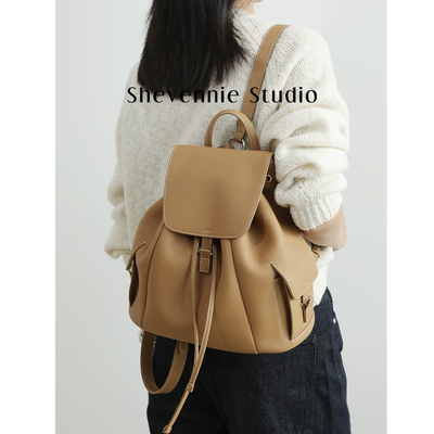 雪芸妮头层牛皮大容量通勤双肩包