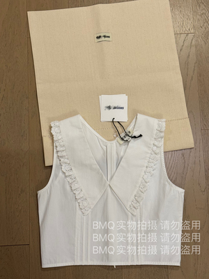 休闲气质设计款V领无袖短上衣女