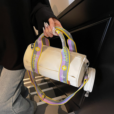 新款女包防水圆筒包时尚旅行包