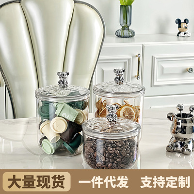 Sealed transparent tape covered household food storage jar,