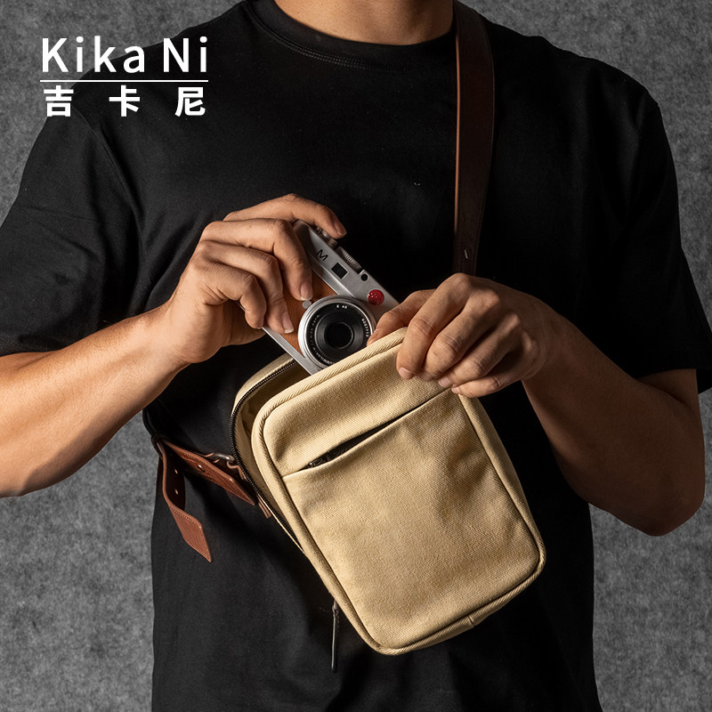 吉卡尼帆布牛皮斜挎包竖款手机包胸包男相机包休闲百搭通勤小背包