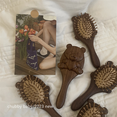 可爱金丝檀木气垫按摩梳