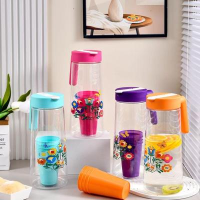 A transparent cold water pitcher with 4 cups, a 2500ml milk