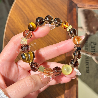 天然花珀水晶茶晶手链女原创设计款时尚金锂云母黄虎眼石手串新款