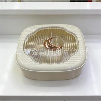 A lightweight luxury household divided candy box with a lid,