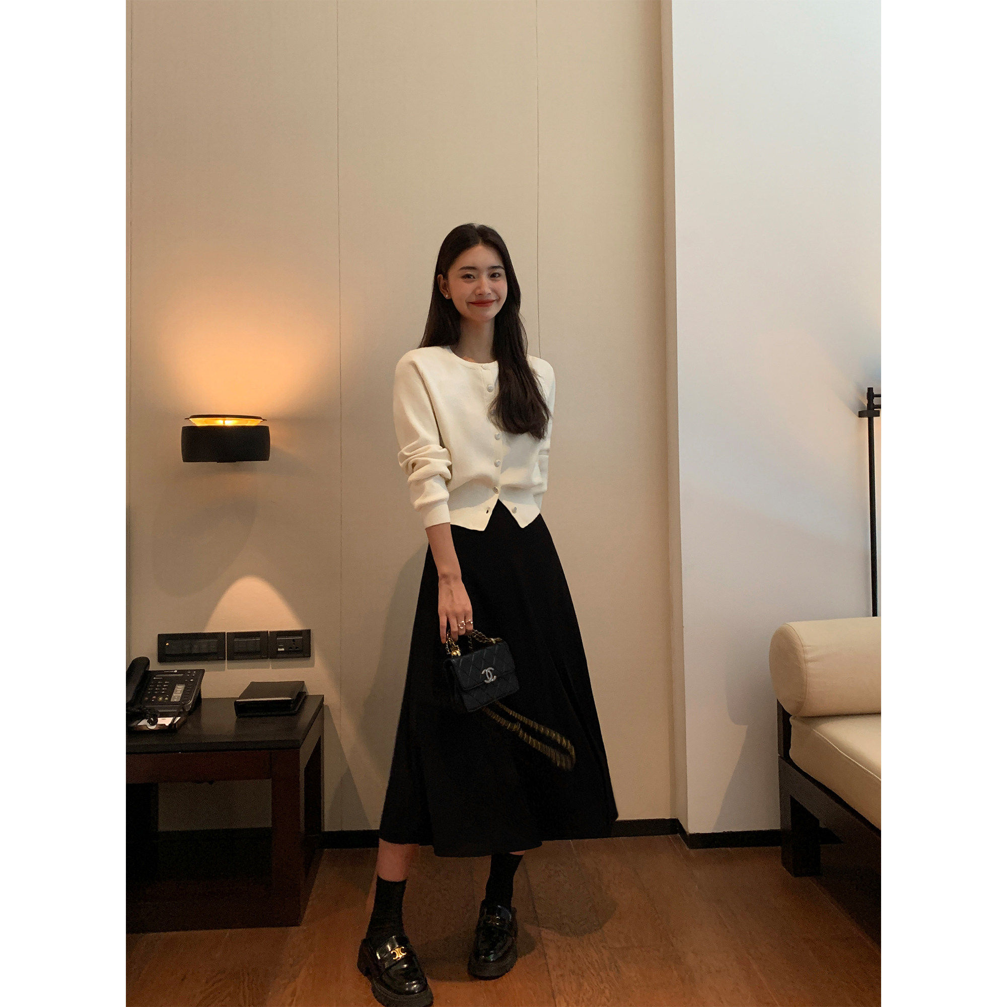 黑色高腰A字中长裙 2025秋季通勤半身裙 Pusumede聚酯纤维女裙