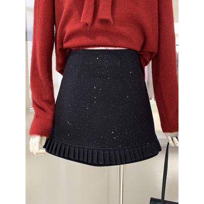 精致俏皮木耳边拼接呢子半身裙女