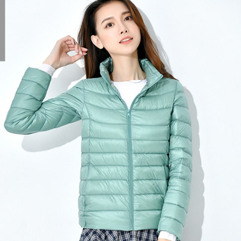 唯品会特卖断码清仓特价处理轻薄白鸭绒羽绒服女装品牌正品春秋冬