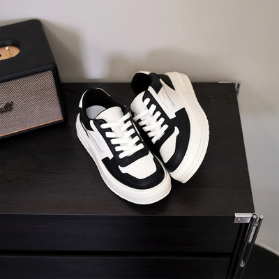 黑白拼色新款牛皮休闲板鞋增高