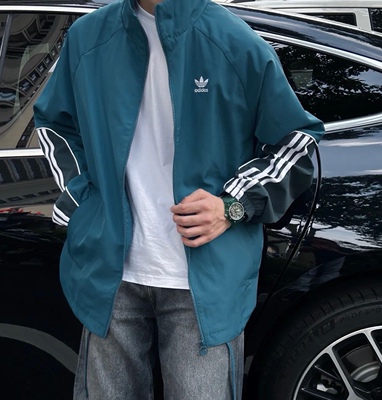 adidas阿迪达斯三叶草运动休闲夹克立领男女梭织外套JE3492