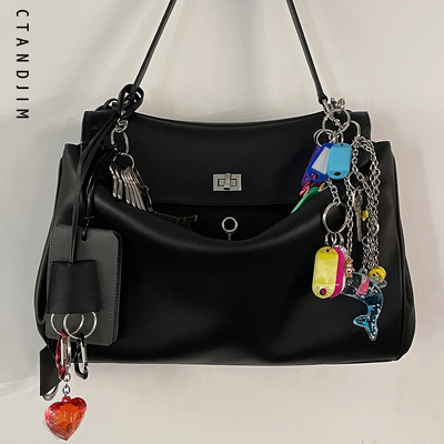 CTANDJIM牛皮不规则斜挎单肩包