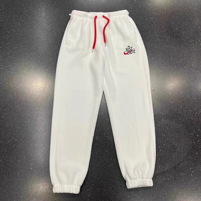 NIKE/耐克 SPORTSWEAR 女子仿羊羔绒收脚运动裤 FD4069-121