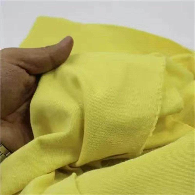 芳纶1414针织布 凯夫拉防火阻燃针刺面料 耐温耐磨手套衣服内衬布