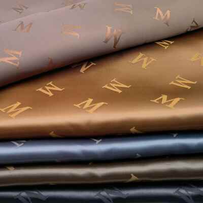 人丝单M提花面料里布TR人丝提花里料大衣西装夹克里衬泰迪熊里布