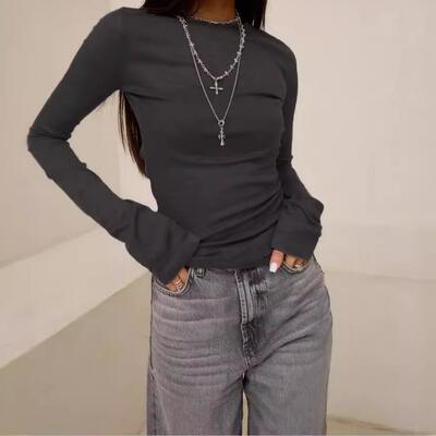 Thin women's top with a slightly transparent outer layer