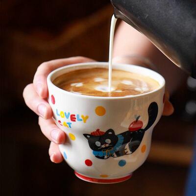 A cute cartoon cat holding a coffee cup, specially designed