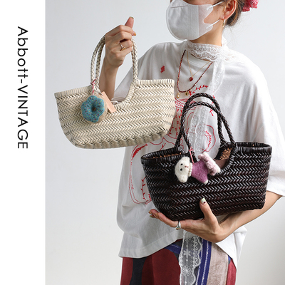 牛皮编织手提斜挎度假包菜篮包