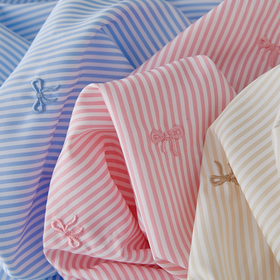 条纹蝴蝶结刺绣涤棉服装布料