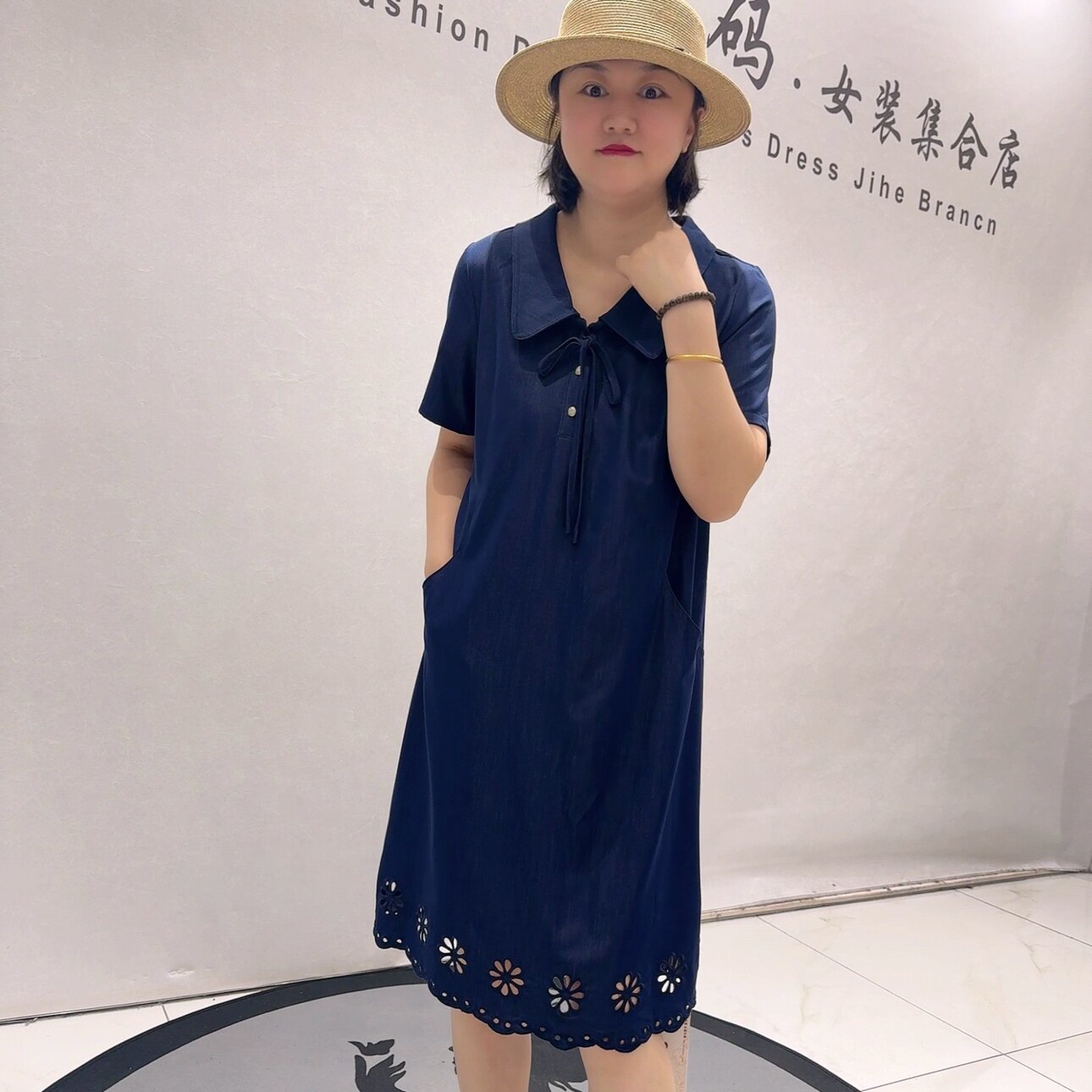 31088女权贵族夏款新品天丝牛仔面料底边镂空花连衣裙加大码女装