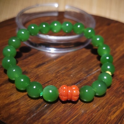 YQ011504 新疆的猫17.2克直径8mm色调靓丽和田玉俄碧玉阳绿色手链