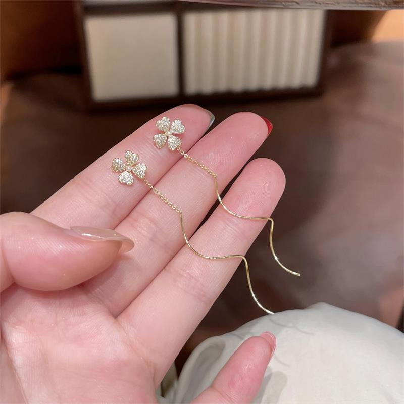 幸运四叶草耳线新款甜美简约925银针耳环女波浪花朵旋转流苏耳饰