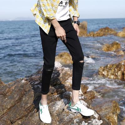 黑色破洞修身小脚九分裤