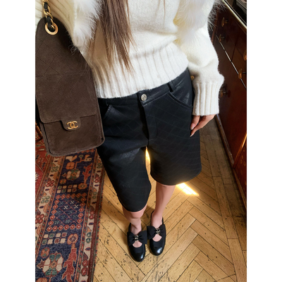 MasMash直筒菱格纹皮中裤