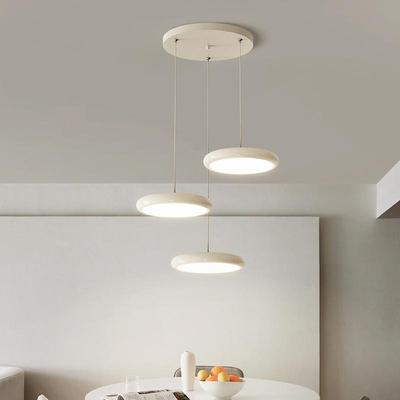 The chandeliers at the full-spectral restaurant are modern a