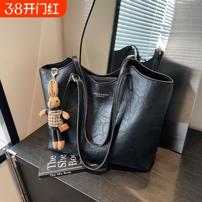 伊布古奇大容量女2025新款通勤简约百搭托特包牛皮手提黑色时尚