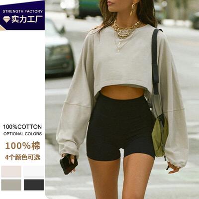 Long sleeved women's top with exposed navel