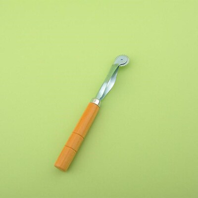 Wooden handle, stainless steel crimping wheel, cloth-pressin