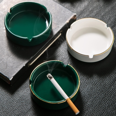 The porcelain ashtray home has a porcelain with a fluorescen