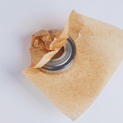 黄色防锈纸工业油纸机械防潮纸金属轴承五金包装纸卷筒蜡纸