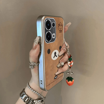 可爱棕熊适用OPPOReno13手机壳新款PKM110防摔镜头全包男女带挂绳电镀外壳创意保护套高级感时尚个性小众情侣