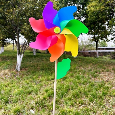 七彩手持木杆风车儿童旋转装饰
