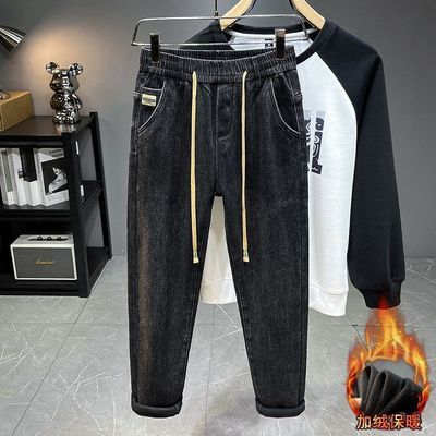 秋冬新款加绒加厚抽绳松紧腰牛仔裤男士潮牌修身小直筒弹力哈伦裤