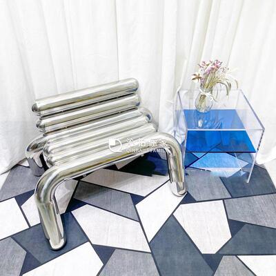 服不装店中具间25402摆放亚力展克示茶桌锈钢欧美风拍摄道休闲椅