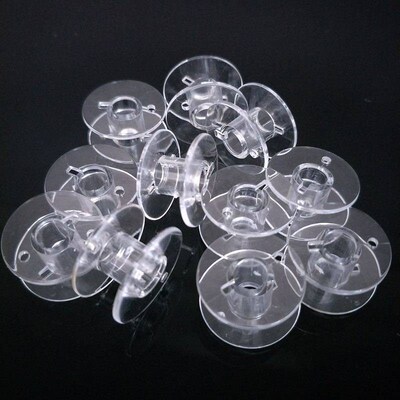 Hot sell 10pcs Clear Plastic Empty Bobbins For Brother Janom